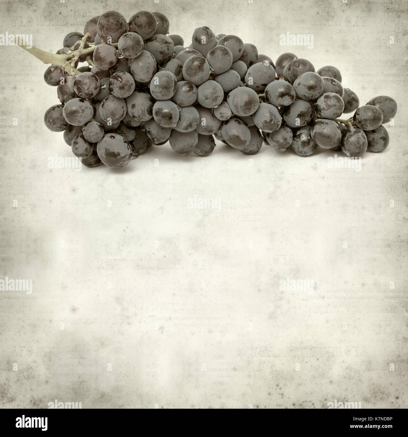 textured old paper background with bunch of dark grapes Stock Photo - Alamy