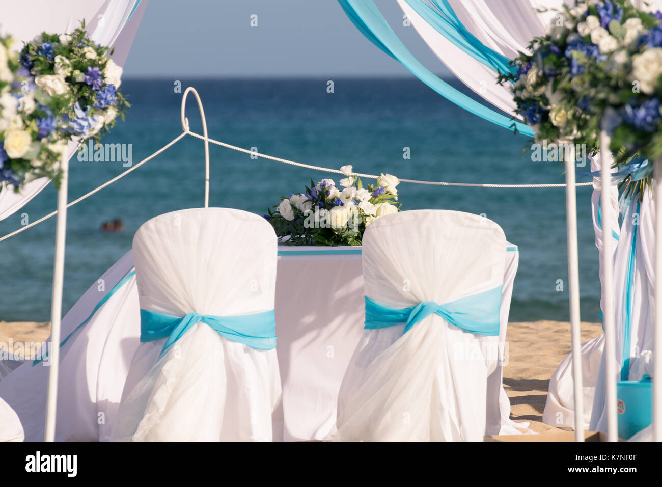 Setting up a wedding on the beach in front of the sea Stock Photo - Alamy