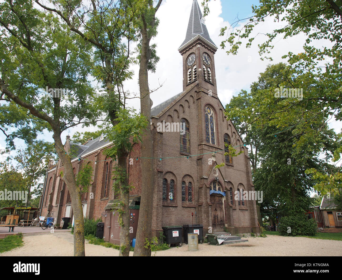 The image shows the church (Kerk) in Ruigoord, Netherlands. Located ...