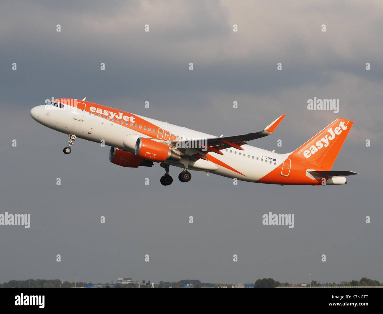 This image captures the takeoff of an easyJet Airbus A320 from Schiphol ...