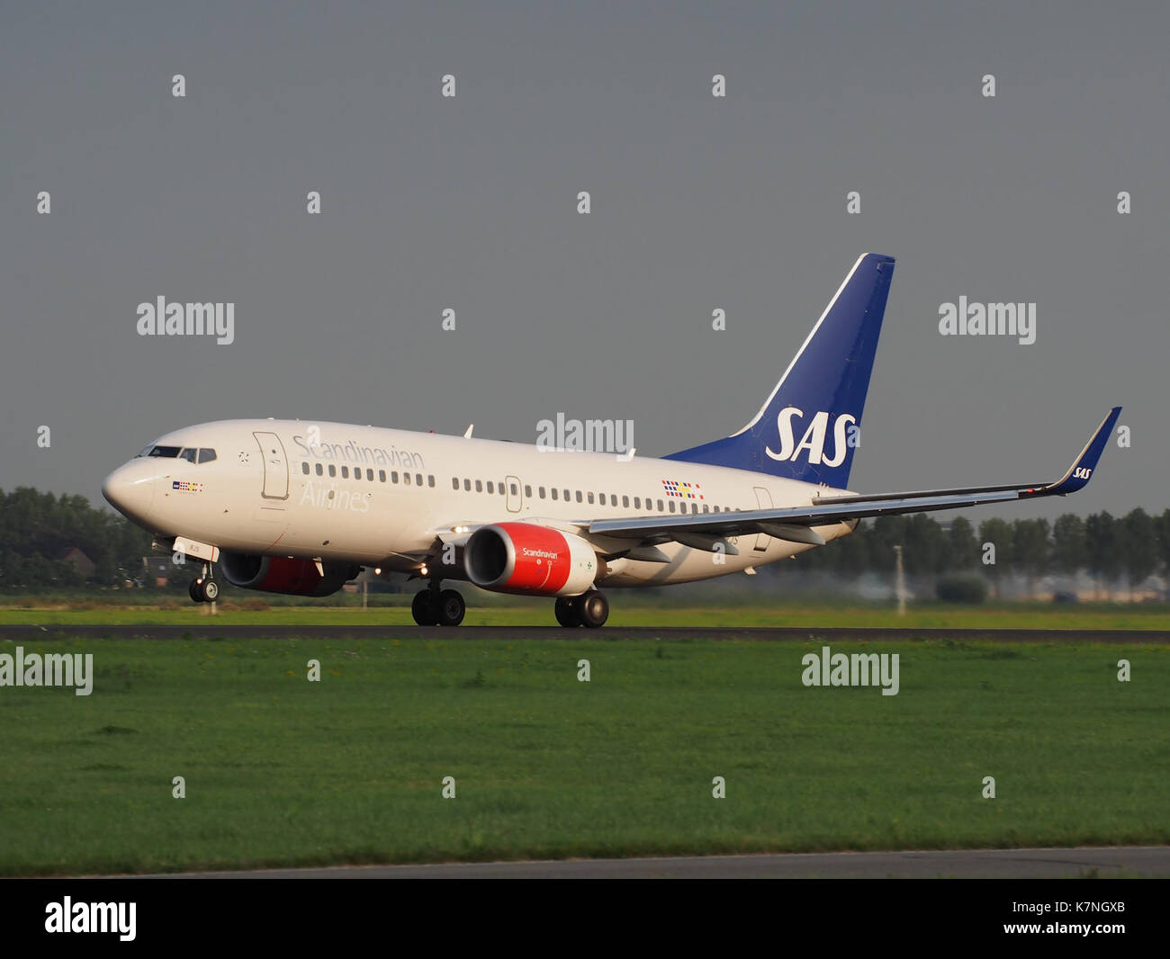 The image captures the takeoff of an SAS Scandinavian Airlines Boeing ...