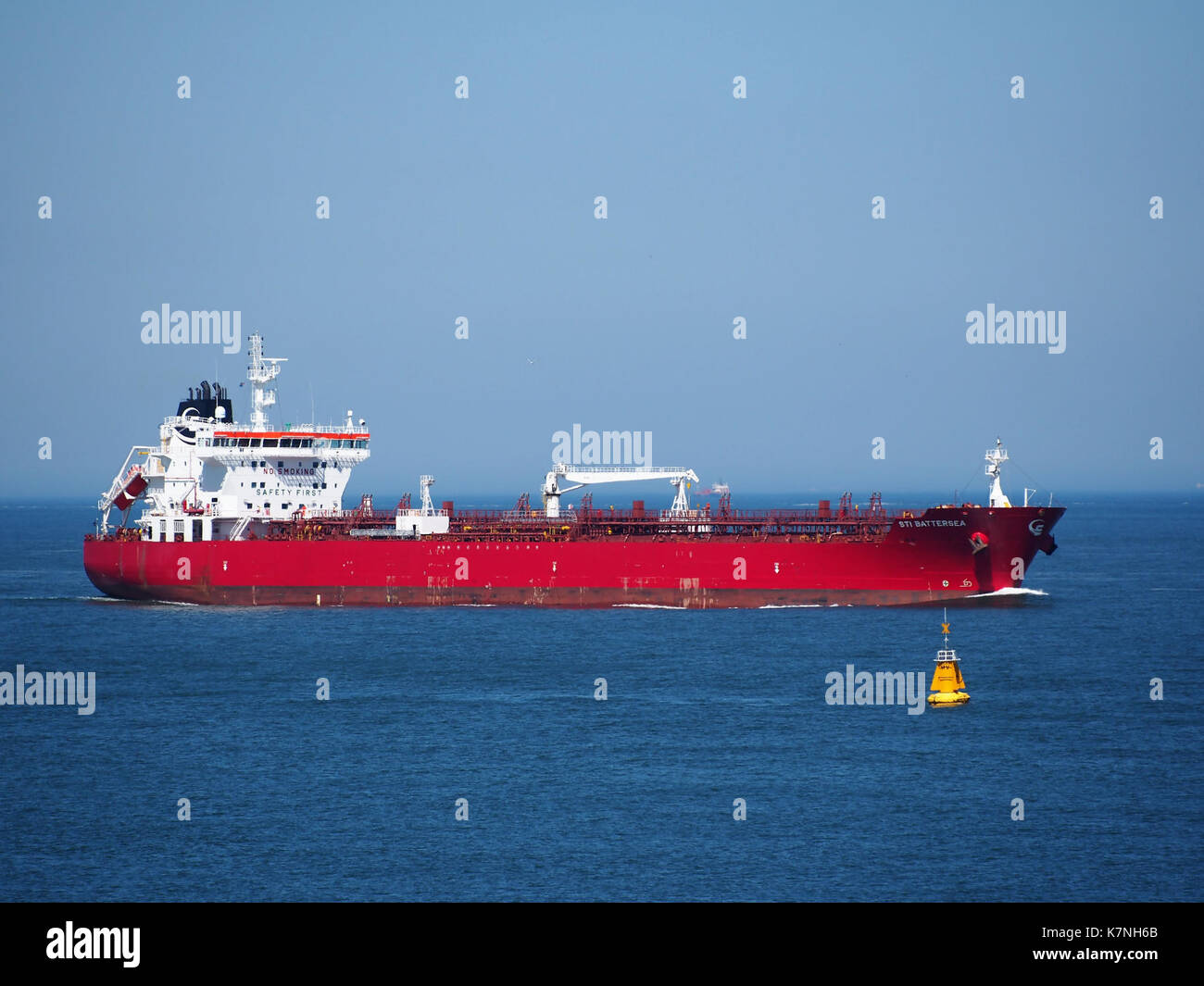 The image depicts the STI Battersea, a ship built in 2014, captured in ...