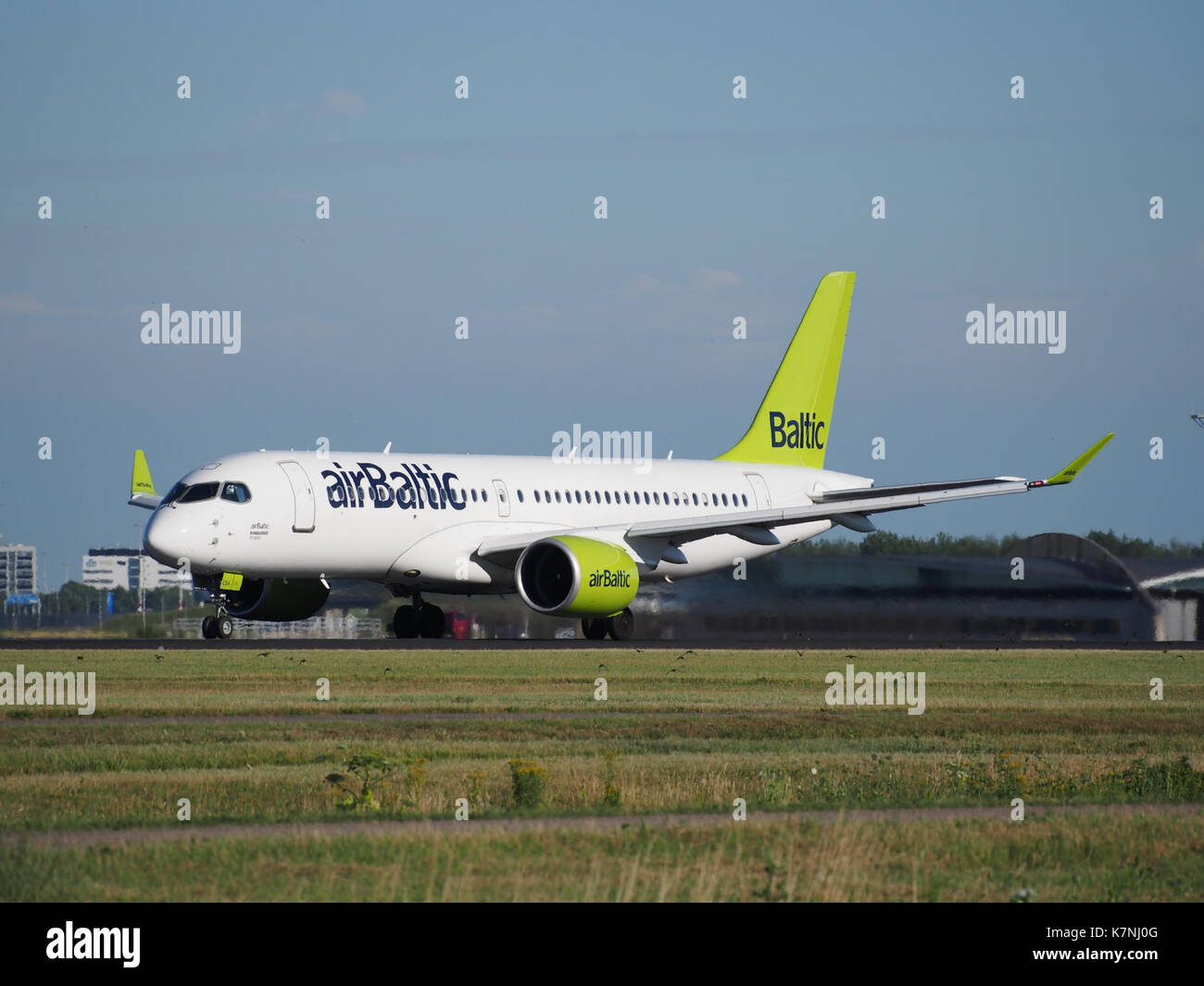 The YL-CSA AirBaltic CS300, a modern Bombardier aircraft, takes off ...
