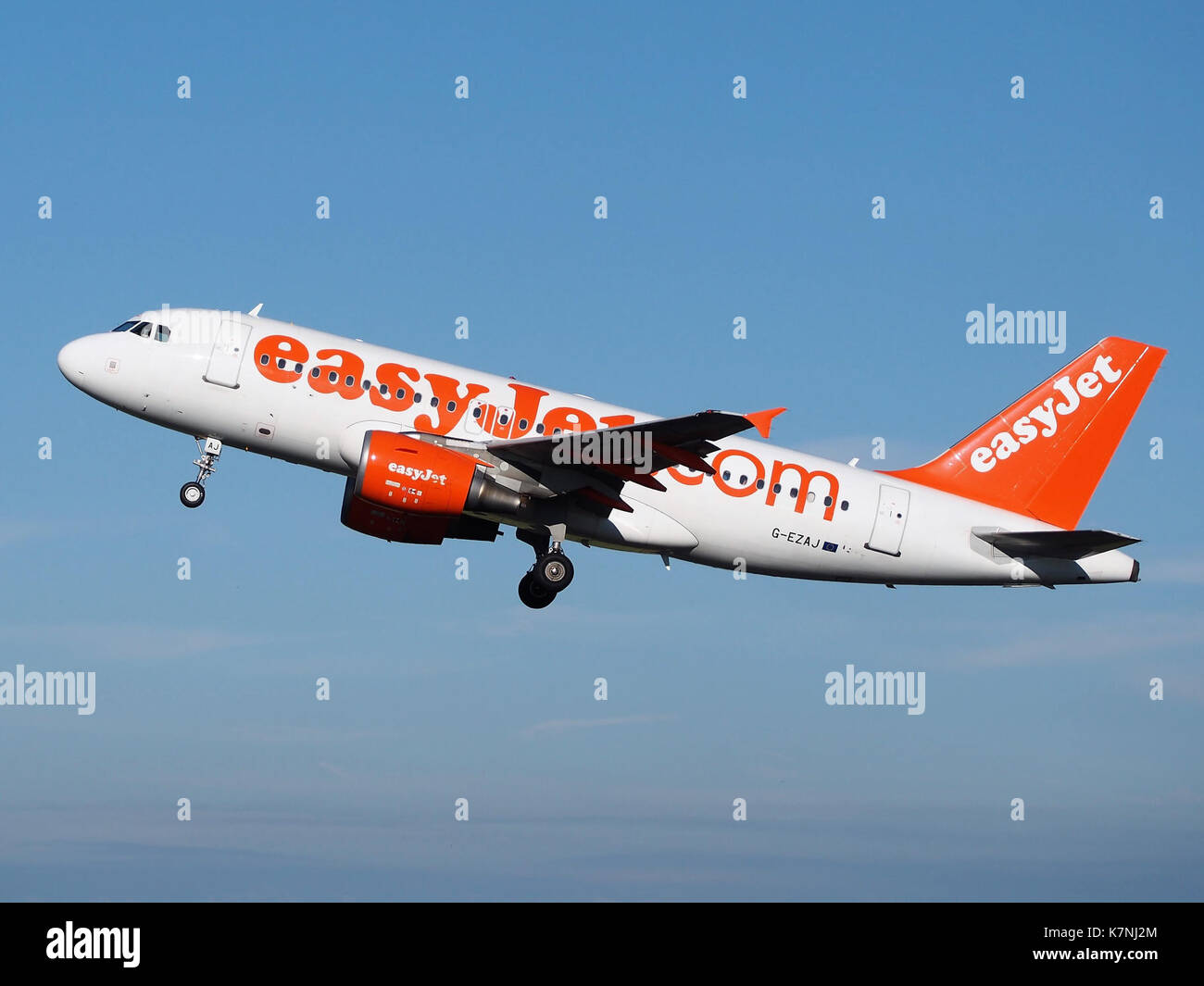 The easyJet Airbus A319-111, registration G-EZAJ, takes off from ...