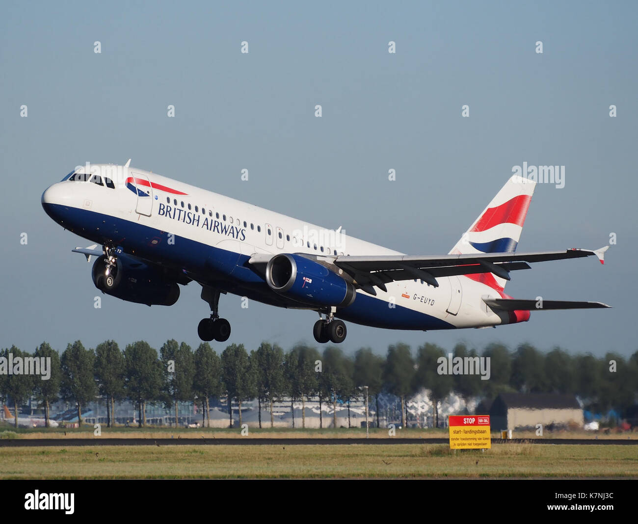 This image shows a British Airways Airbus A320-232 (registration G-EUYD ...