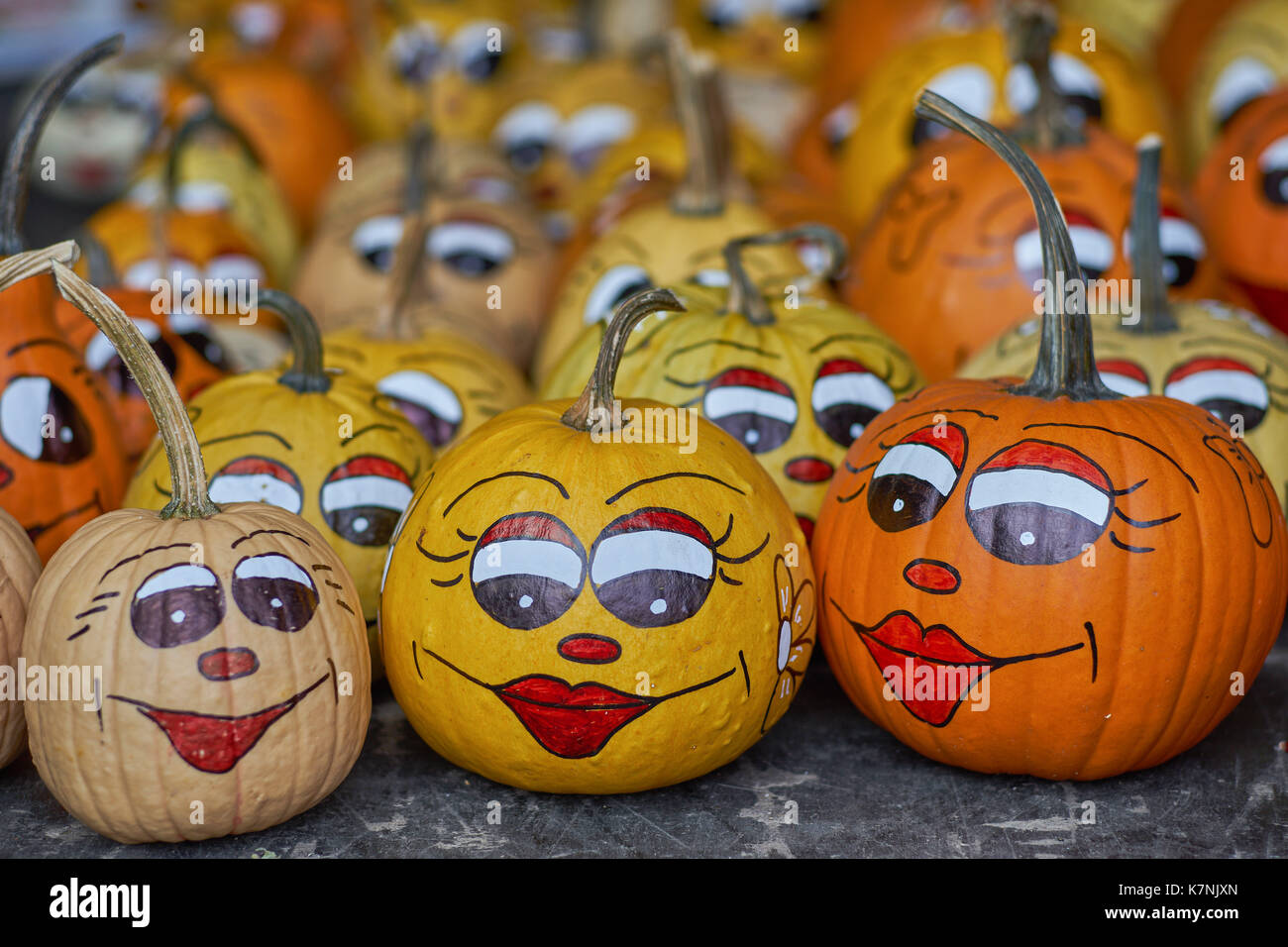 Smiling pumpkins Pumpkins with painted eyes lips nose and eyebrows many ...