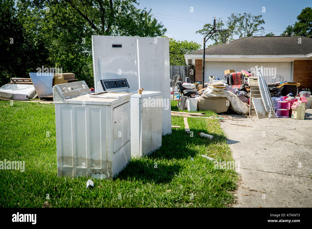 Trash and debris out side of homes devastated by Hurricane Harvey Stock ...
