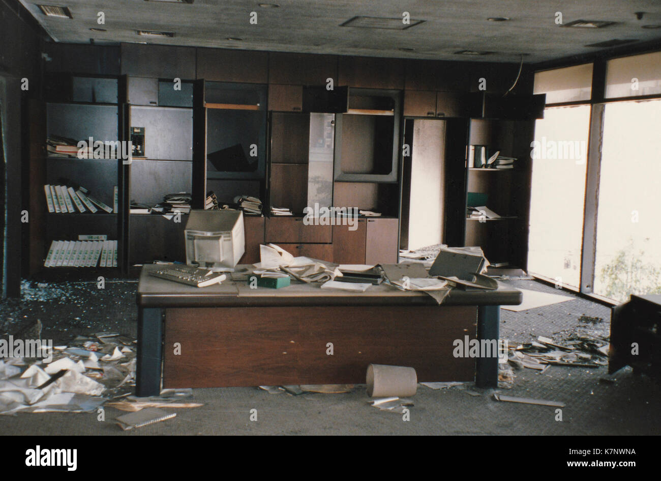 Computer on desk of ransacked and burned office following Persian Gulf ...