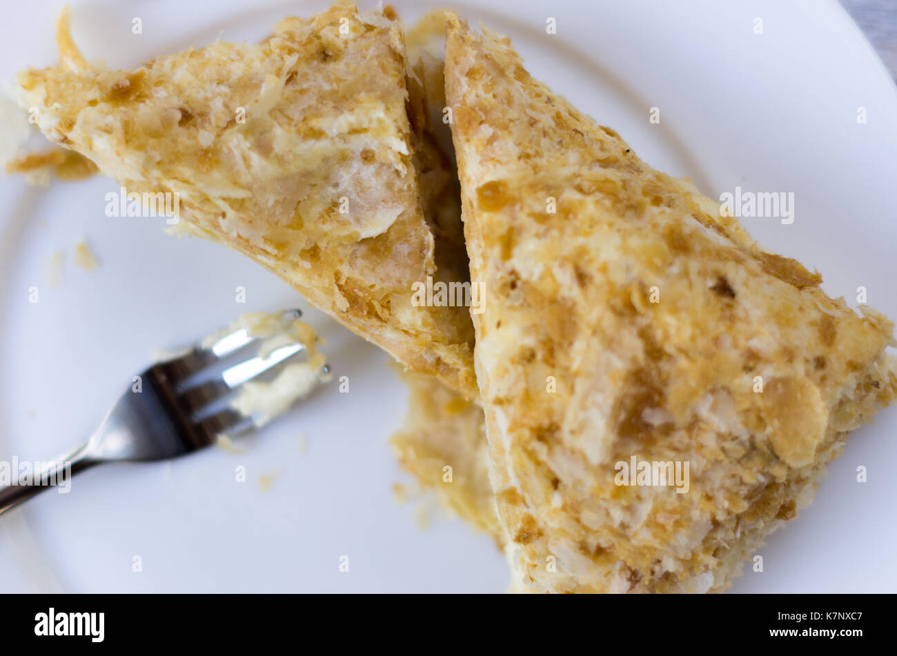 Puff cake with cream. Morning dessert. View from above Stock Photo - Alamy