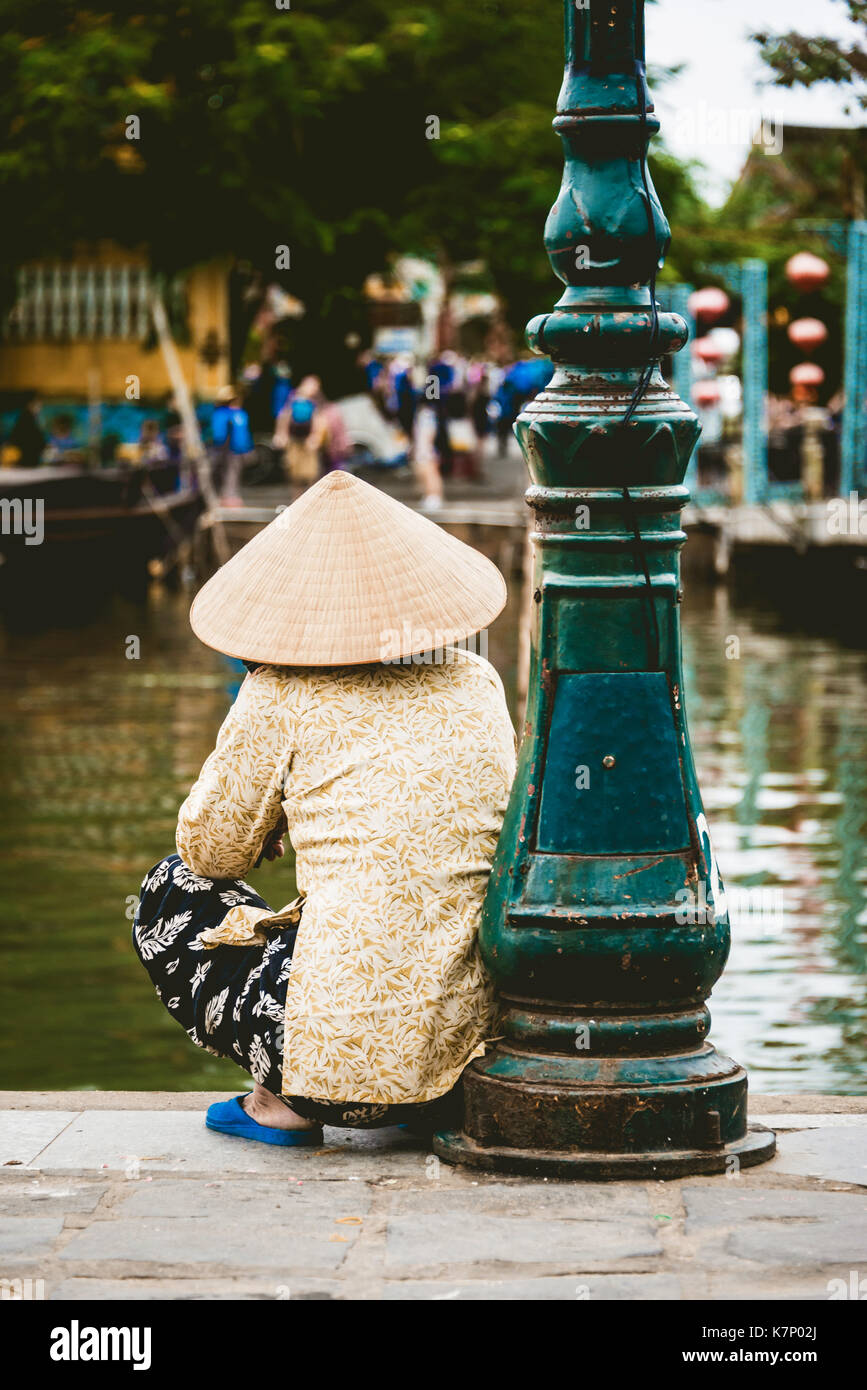 Woman sits on shore hi-res stock photography and images - Alamy