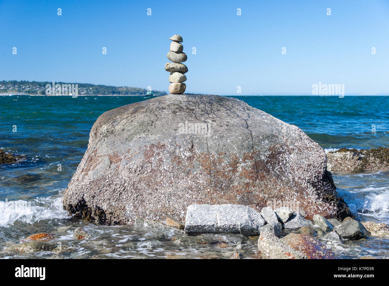 Rock balancing in Vancouver stone stacking garden Stock Photo - Alamy