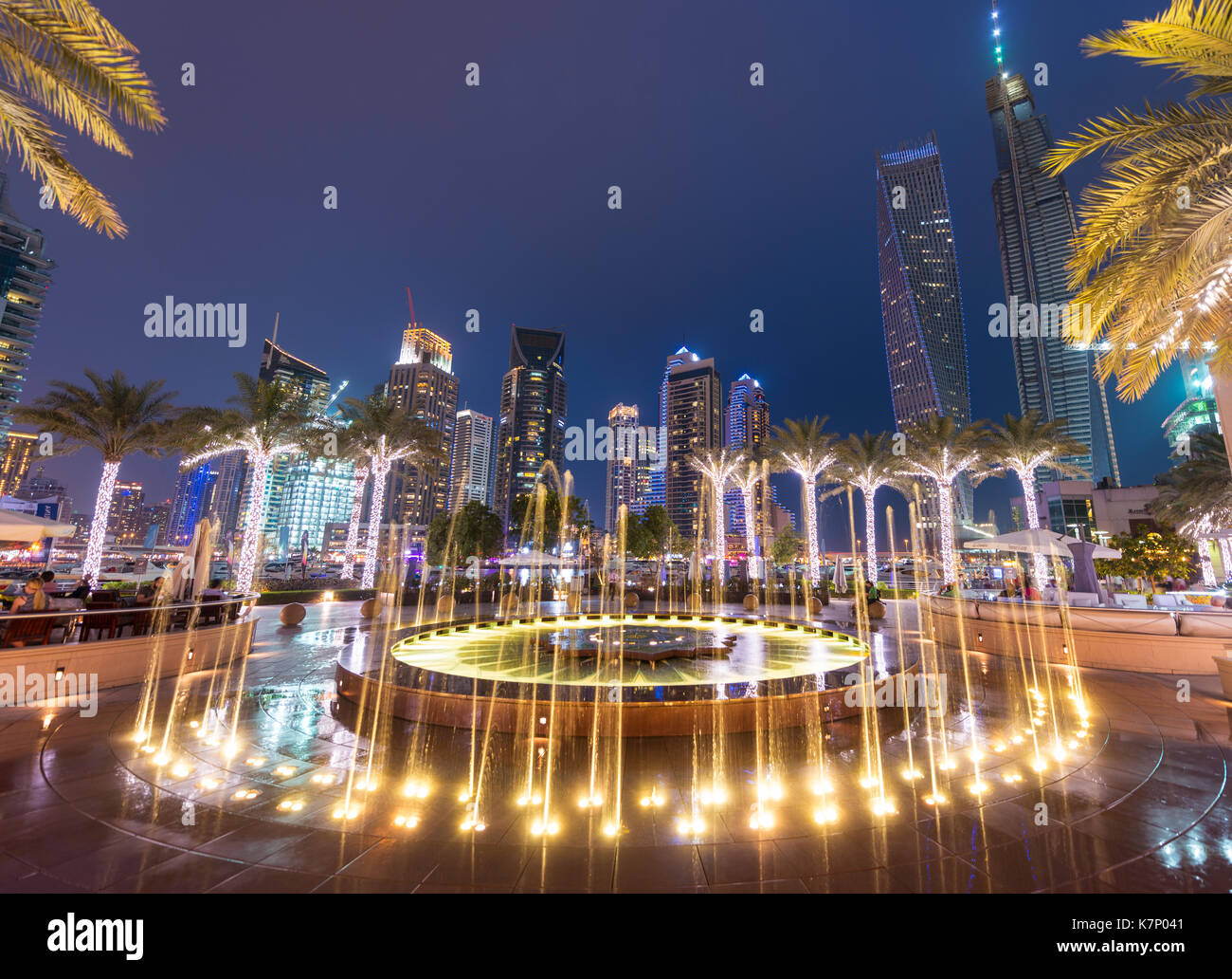 Square with illuminated well, night photo, Dubai Marina, Dubai, Dubai ...