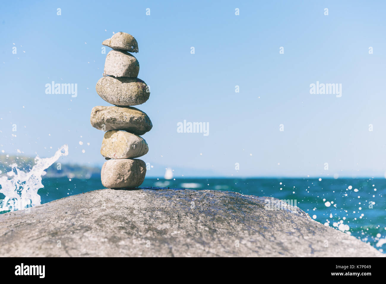 Rock balancing in Vancouver stone stacking garden Stock Photo - Alamy
