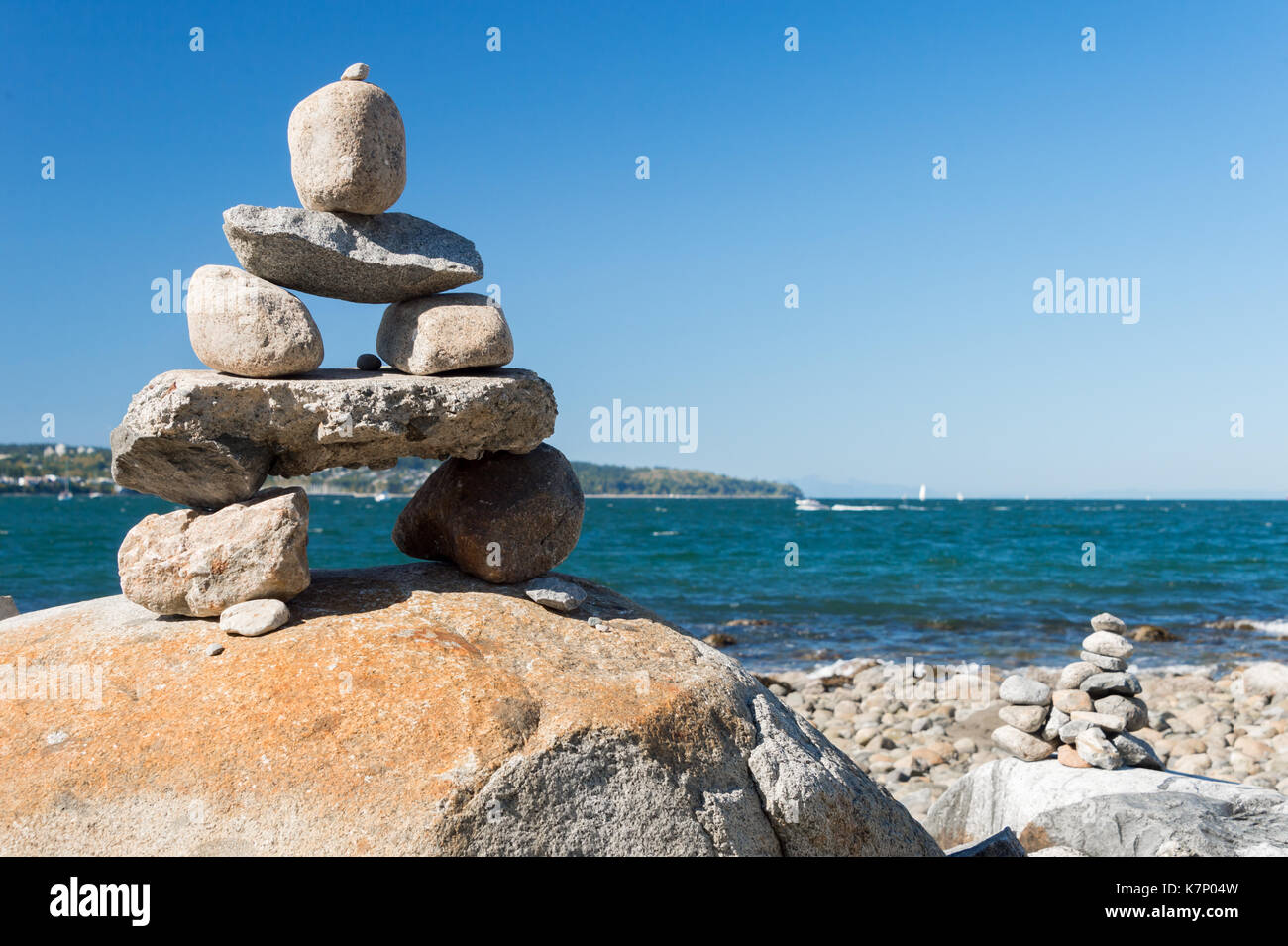 Stone symbol inukshuk in english bay hi-res stock photography and ...