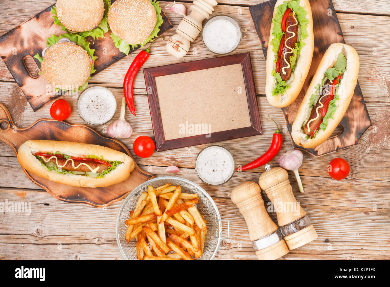 Dining table on the Hot Dog Day with copy space. Fast food, hotdogs ...