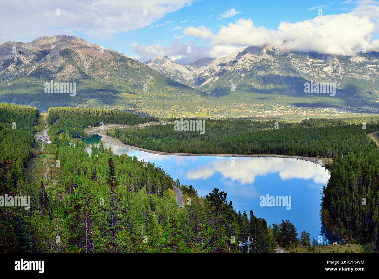 Beautiful high mountains of the Canadian Rockies reflecting in an ...