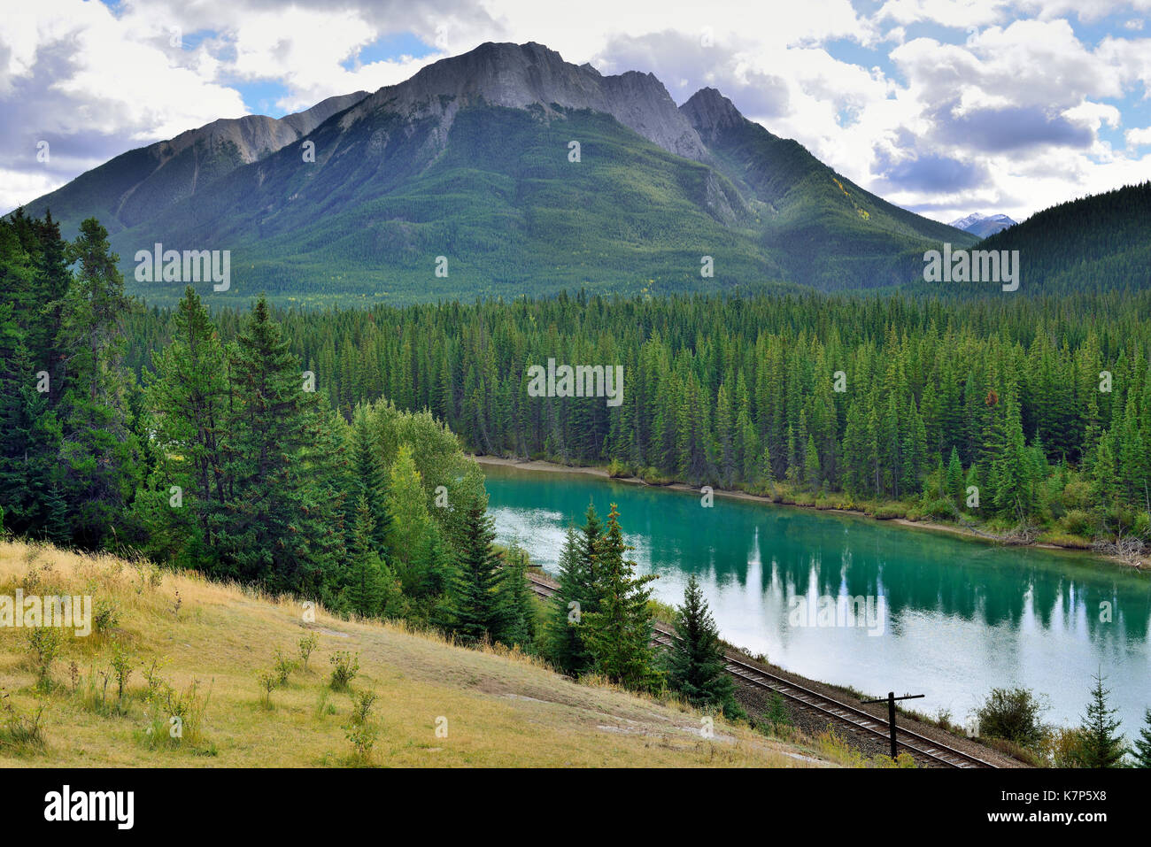 Beautiful high mountains of the Canadian Rockies reflecting in an ...