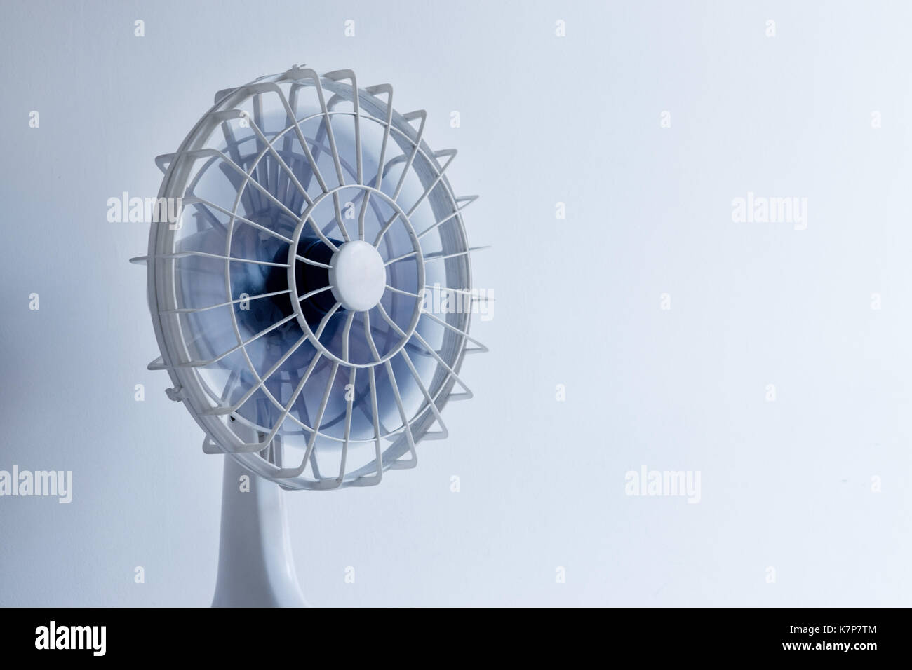 White electric fan, blue cyanotype tones, fan movement and blue, white ...