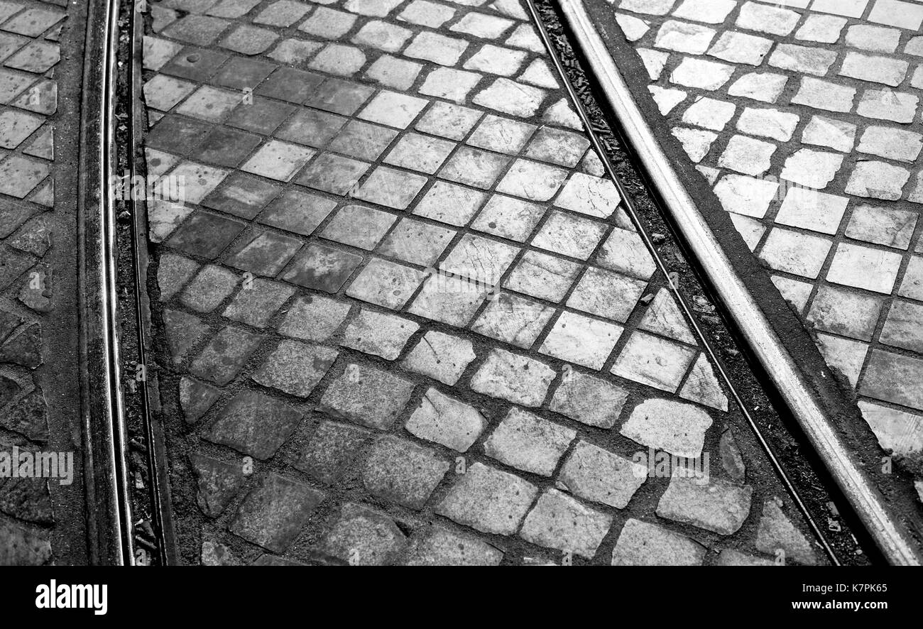 Tramway line on a traditional cobblestone pavement of a street in ...