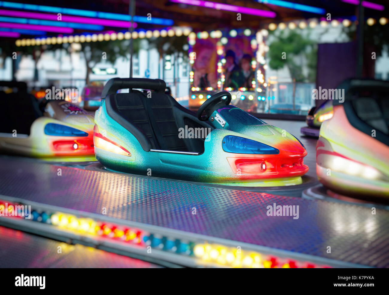 Colorful electric bumper car in amusement park Stock Photo - Alamy