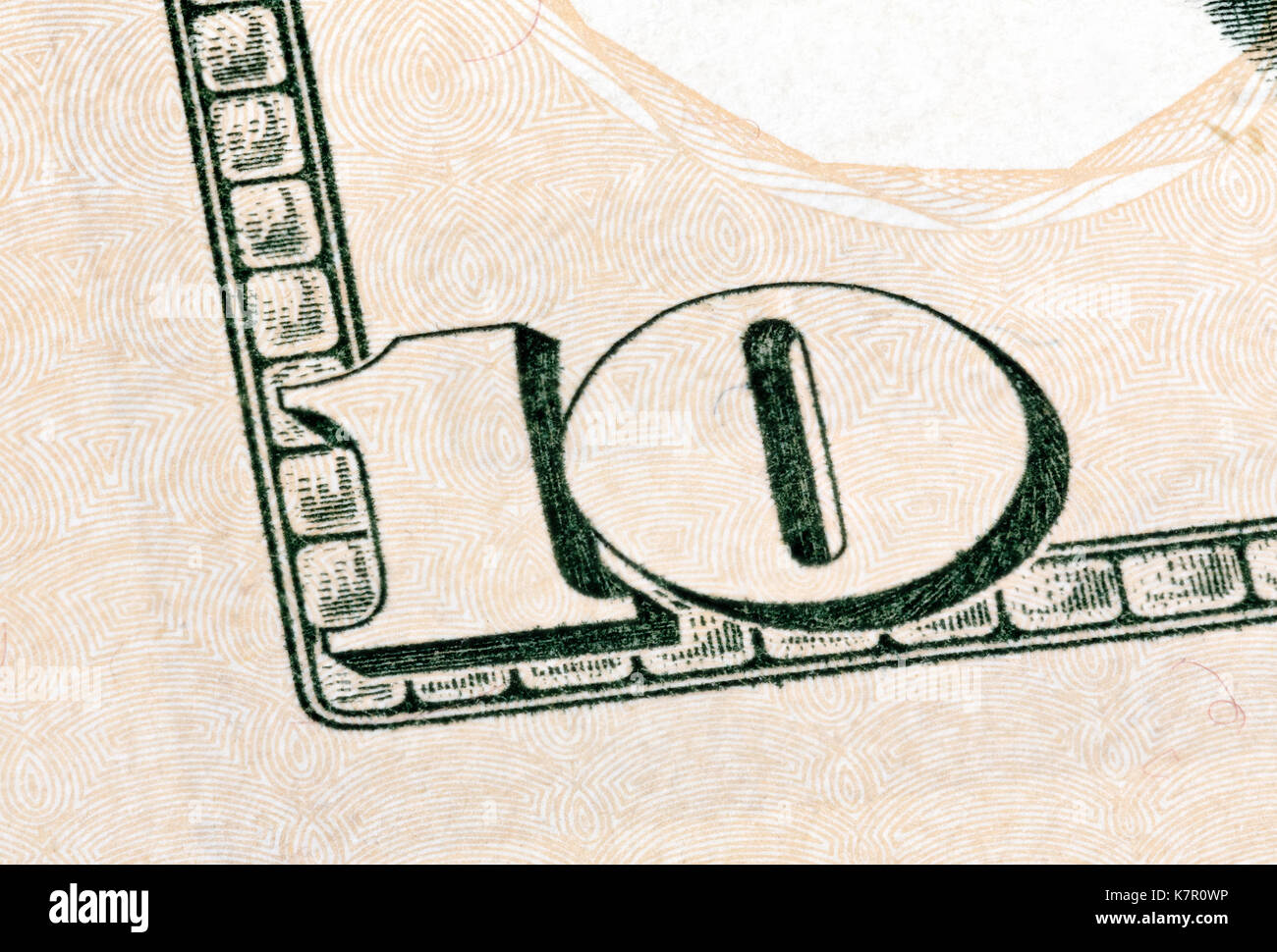 Detail of 10 dollars banknote isolated on white background. Stacked ...