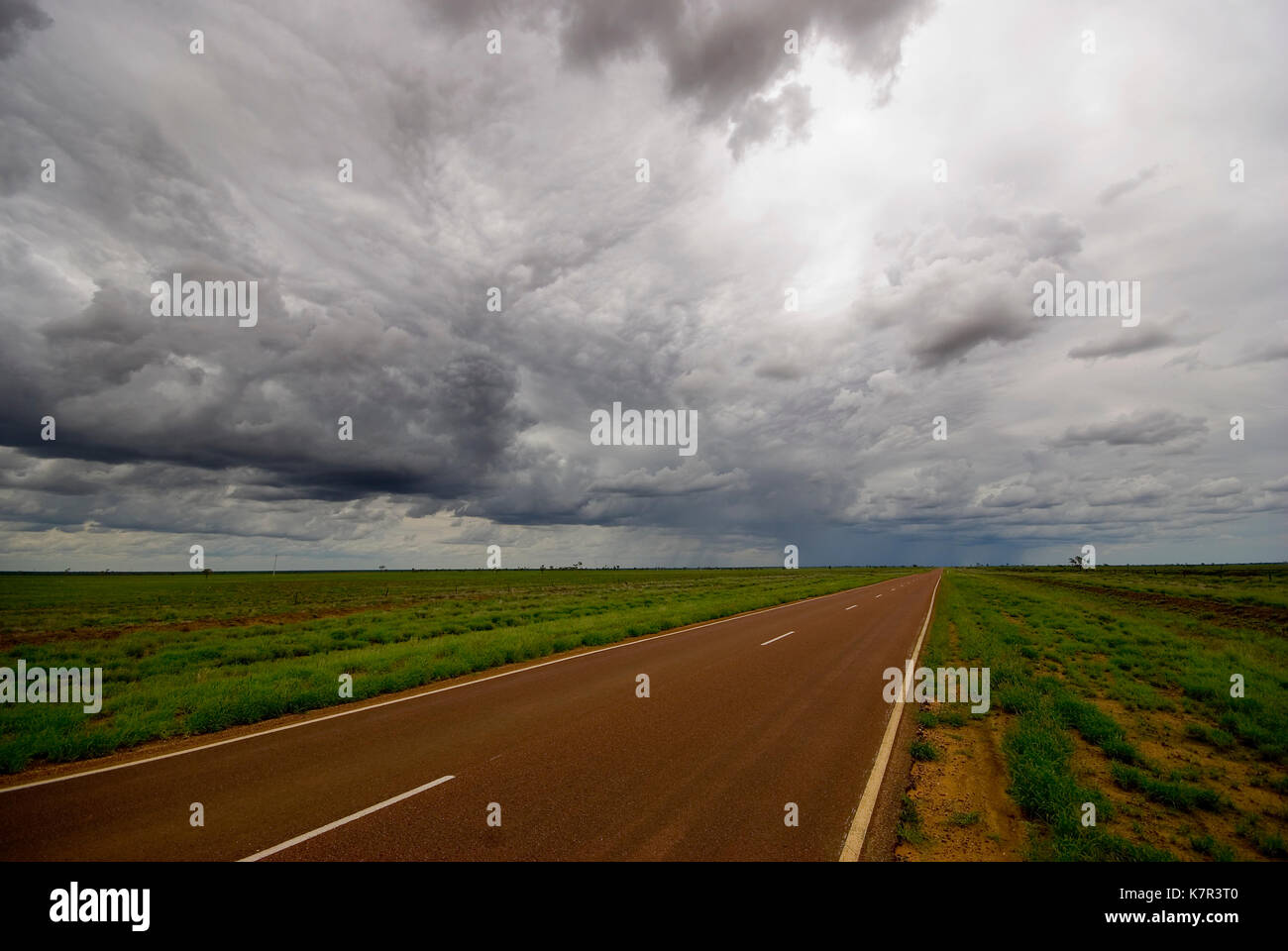 storm clouds over outback road, Western Queensland Australia Stock ...