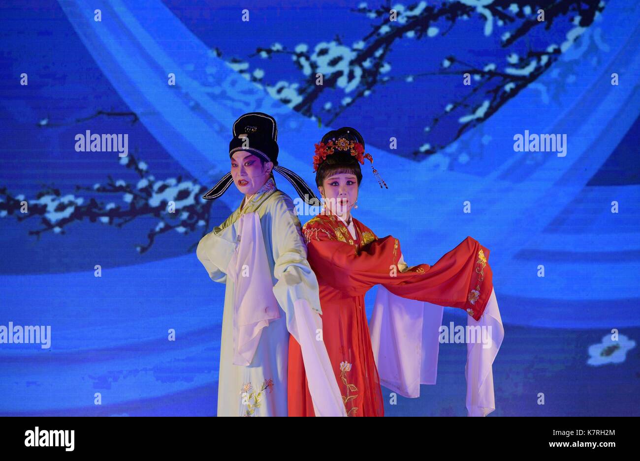 Enshi, China's Hubei Province. 17th Sep, 2017. Actors perform flower ...