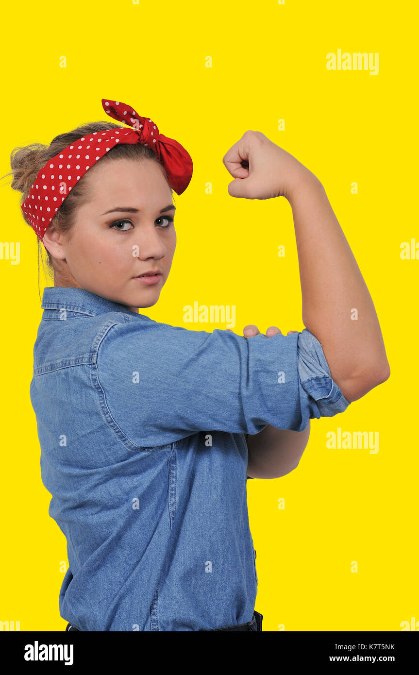 Beautiful woman dressed as the iconic Rosie the Riveter Stock Photo - Alamy