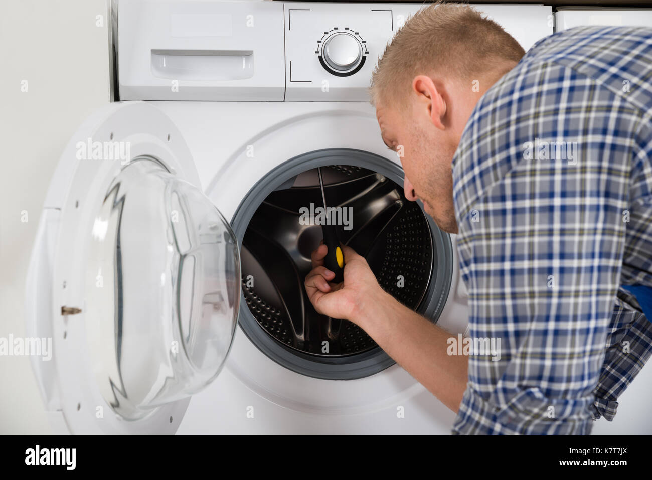 Machine for fixing hi-res stock photography and images - Alamy