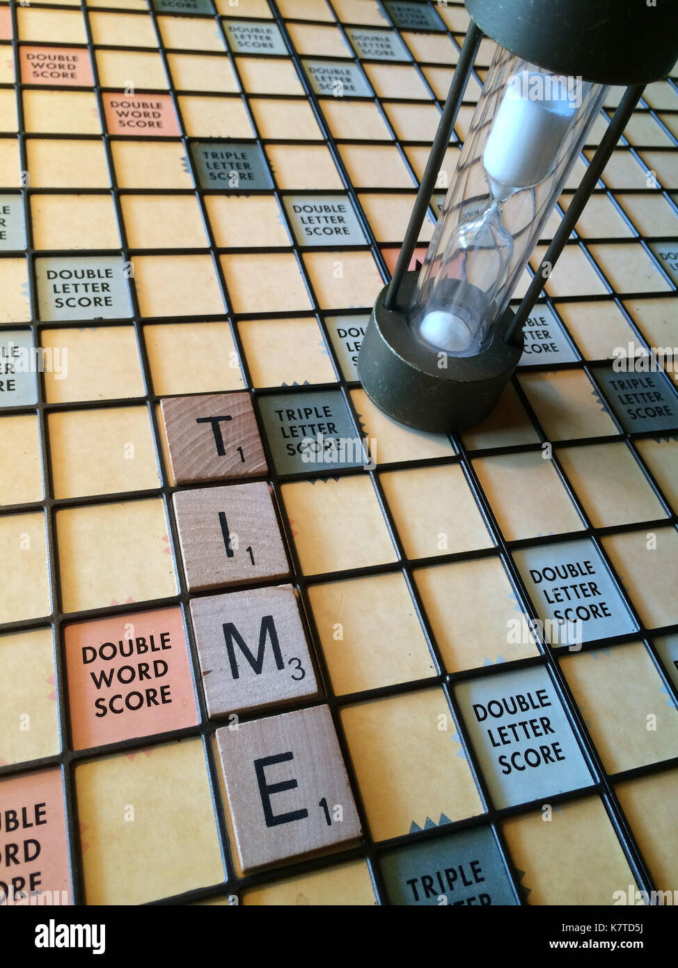 Spelling spell out with scrabble tiles hi-res stock photography and ...