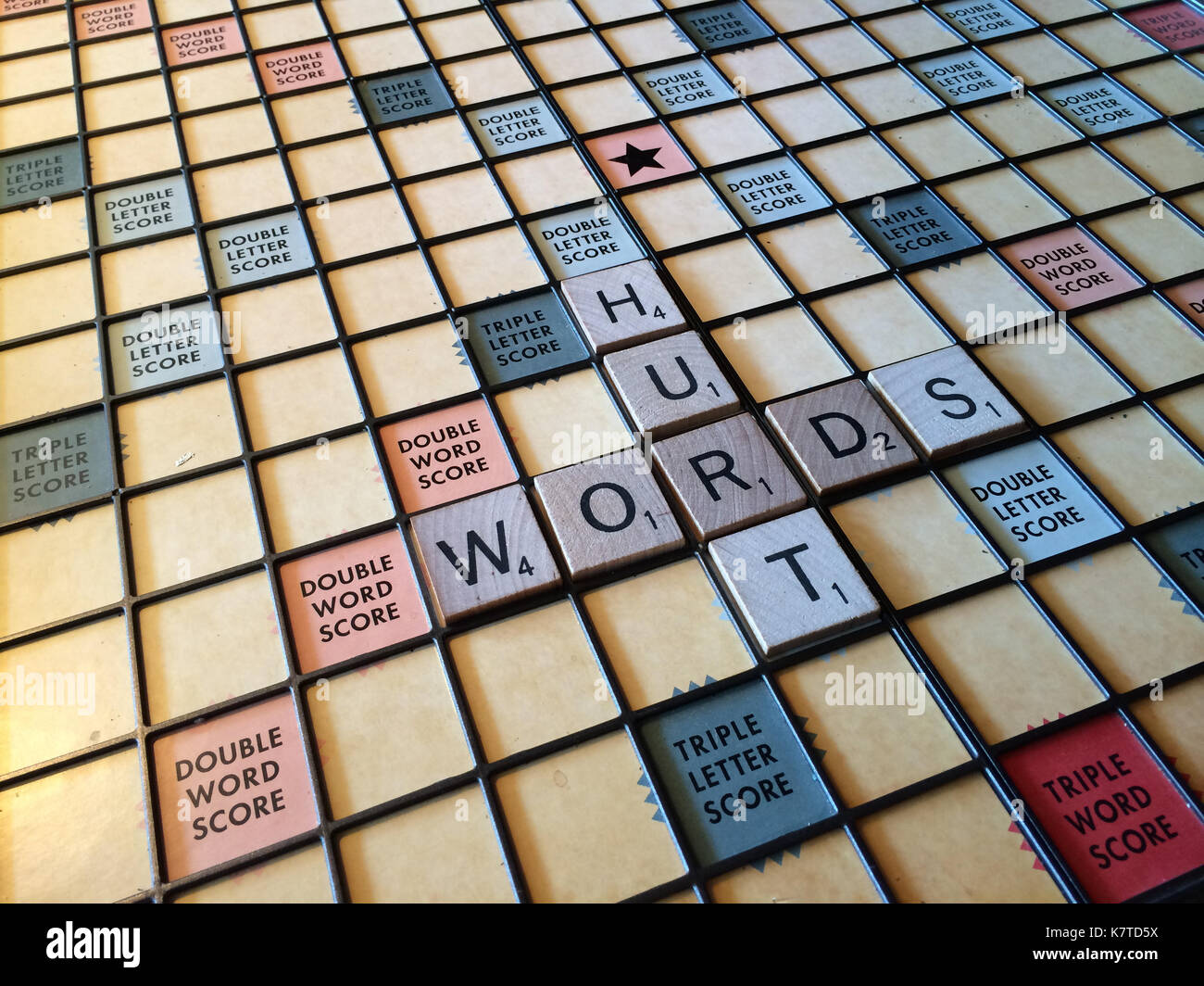 Spelling spell out with scrabble tiles hi-res stock photography and ...