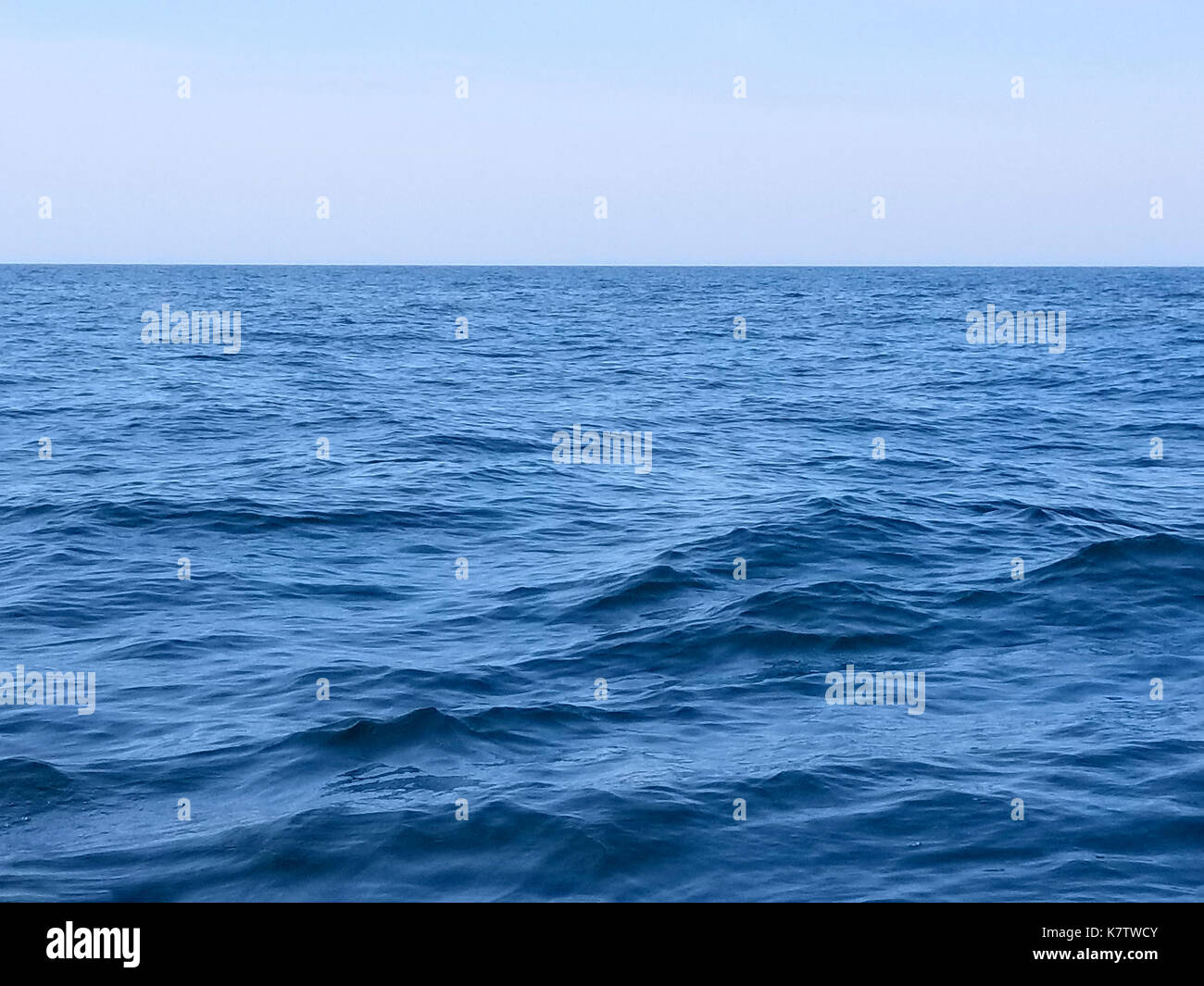 blue Lake Michigan water with pastel sky horizon Stock Photo - Alamy