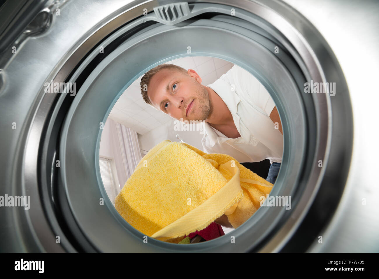 Washing Clothes Using Washing Machine