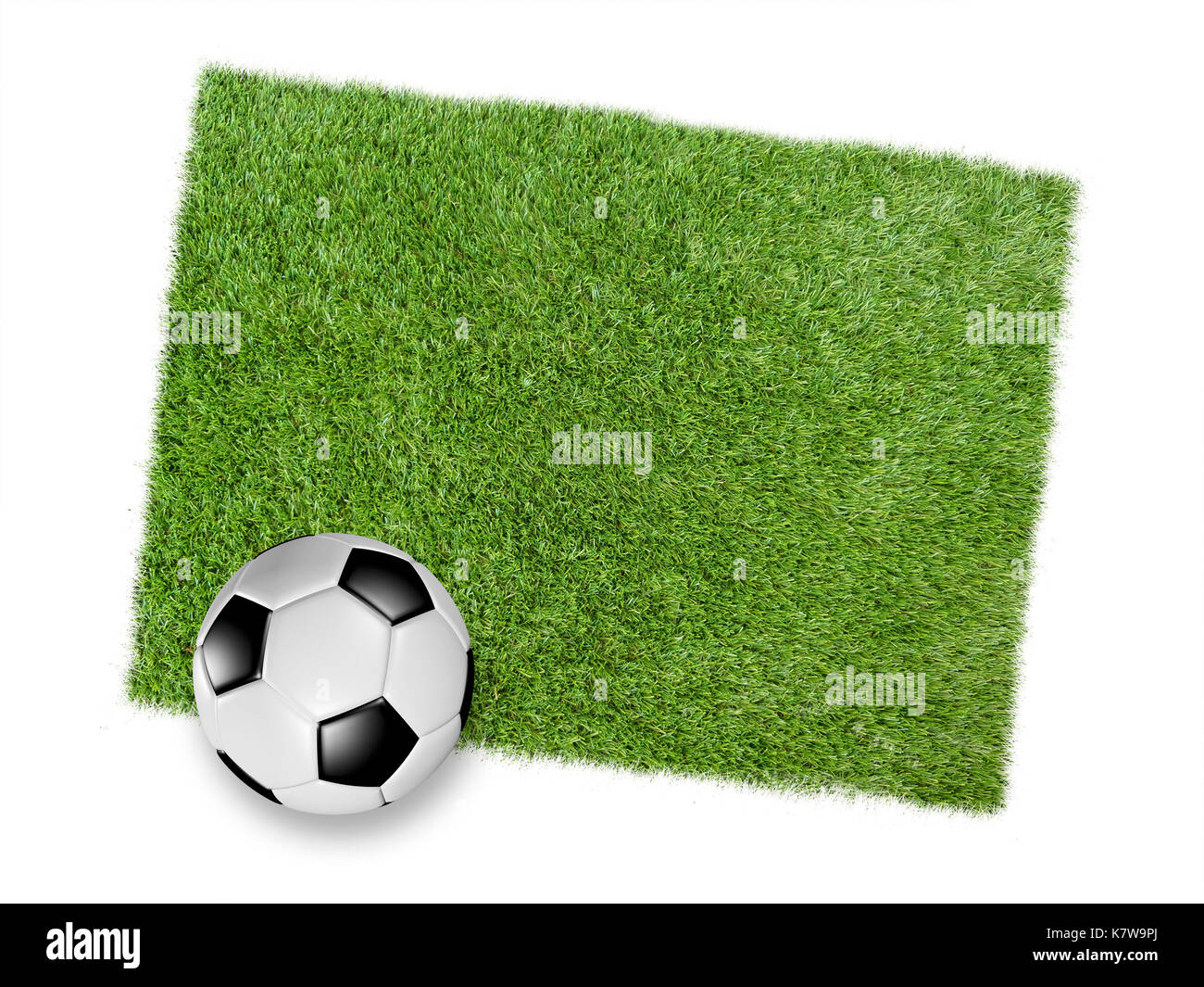 Football or soccer ball on a small rectangular patch of green turf ...