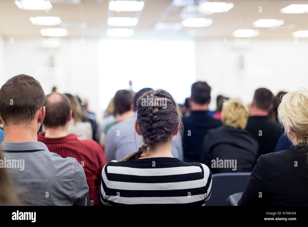 Woman giving presentation on business conference Stock Photo - Alamy