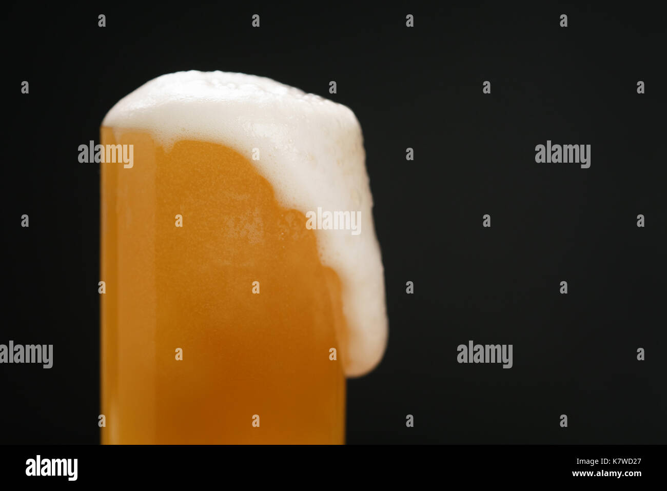 wheat unfiltered beer poured into glass over dark background Stock ...