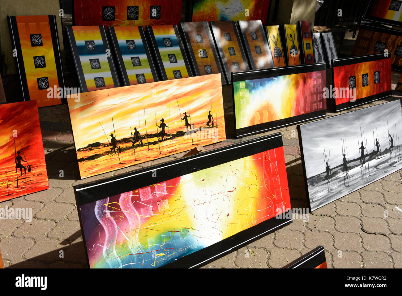 A street art market with paintings produced by local artists on sale at ...