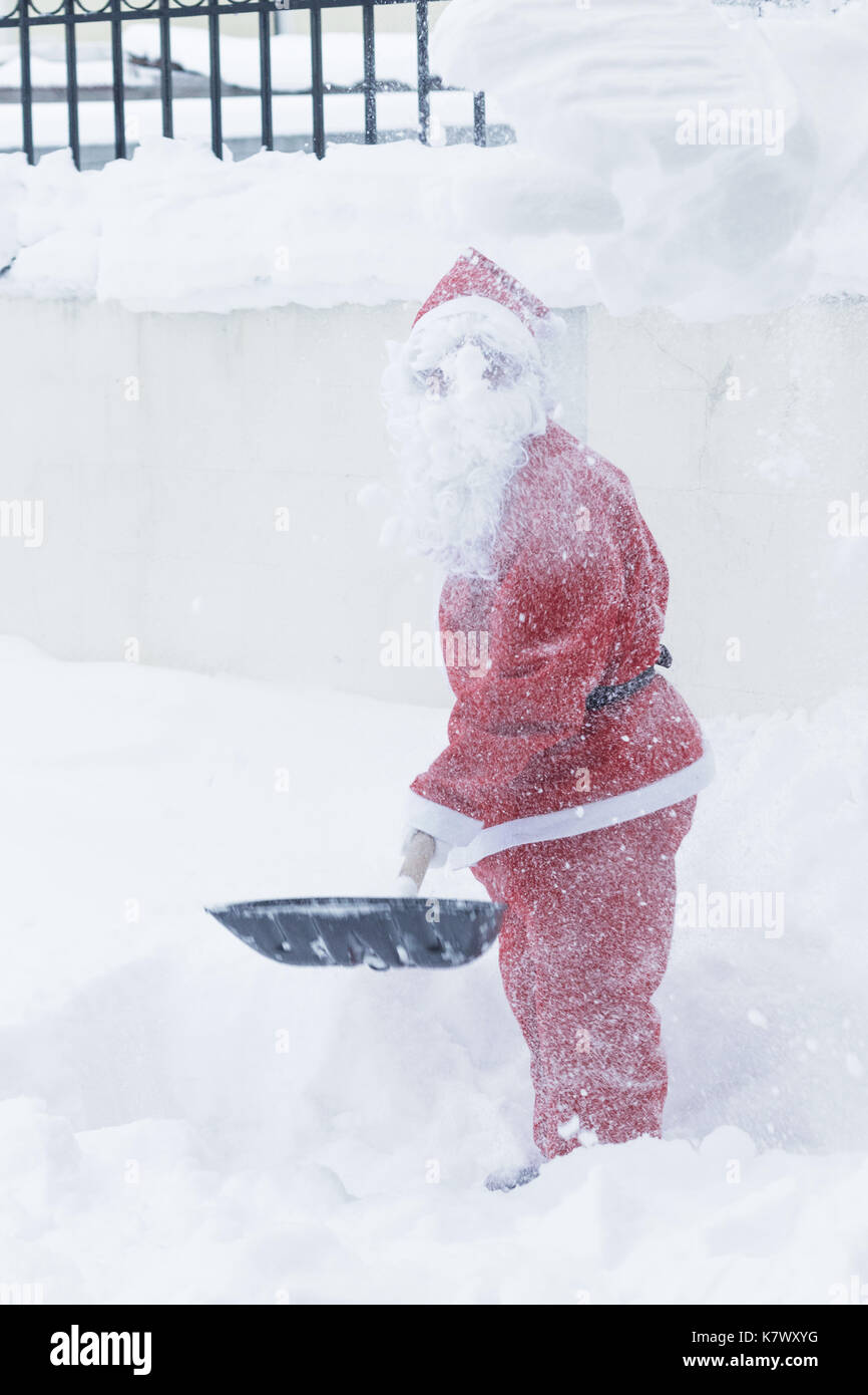 santa claus taking with shovel snow away to make the way free Stock ...