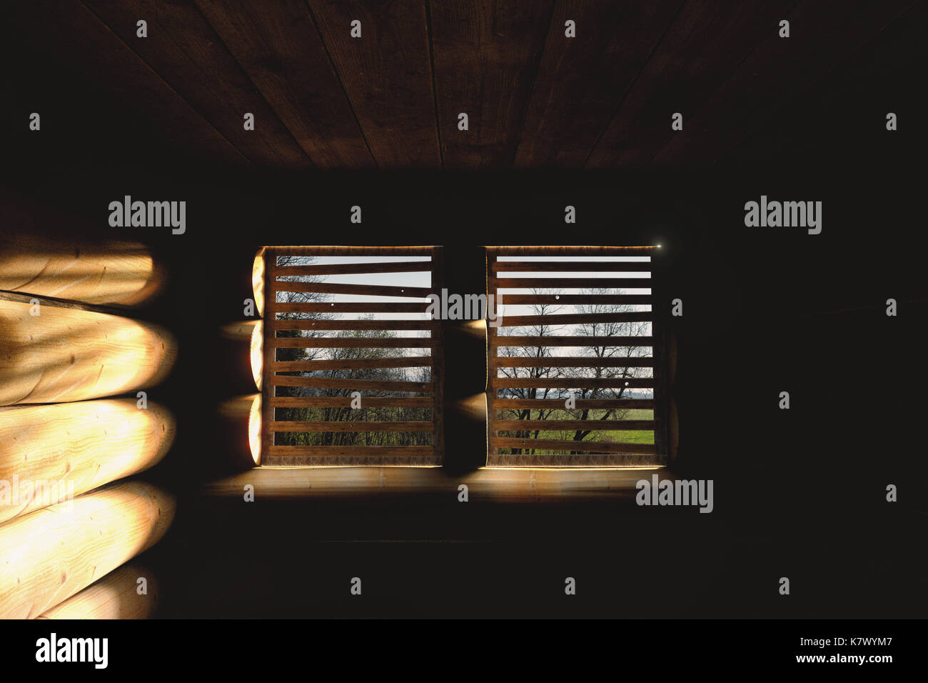 3d rendering of old wooden cabin with sunlight through window Stock ...