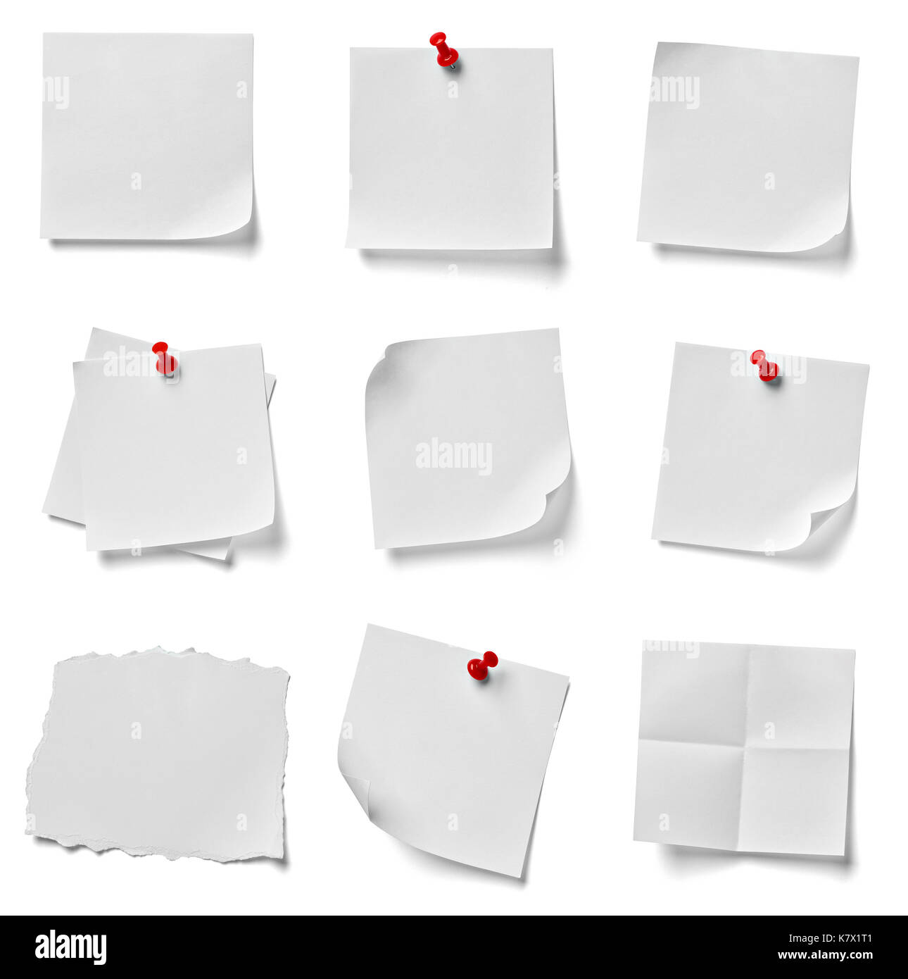collection of various note paper with a red push pin on white ...