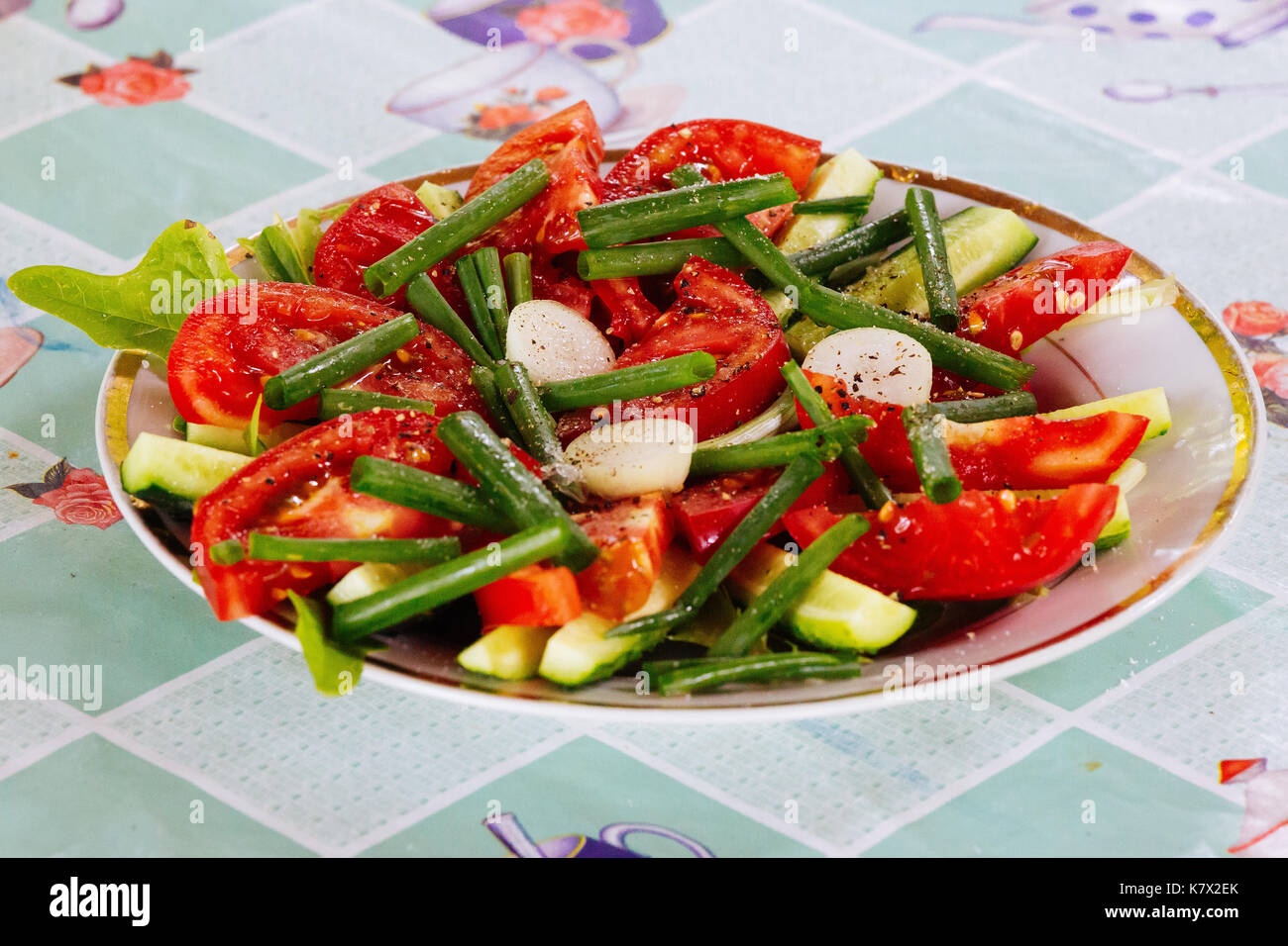 Plate with mix vegetable salad seasoned vegetable oil, salt and ground ...