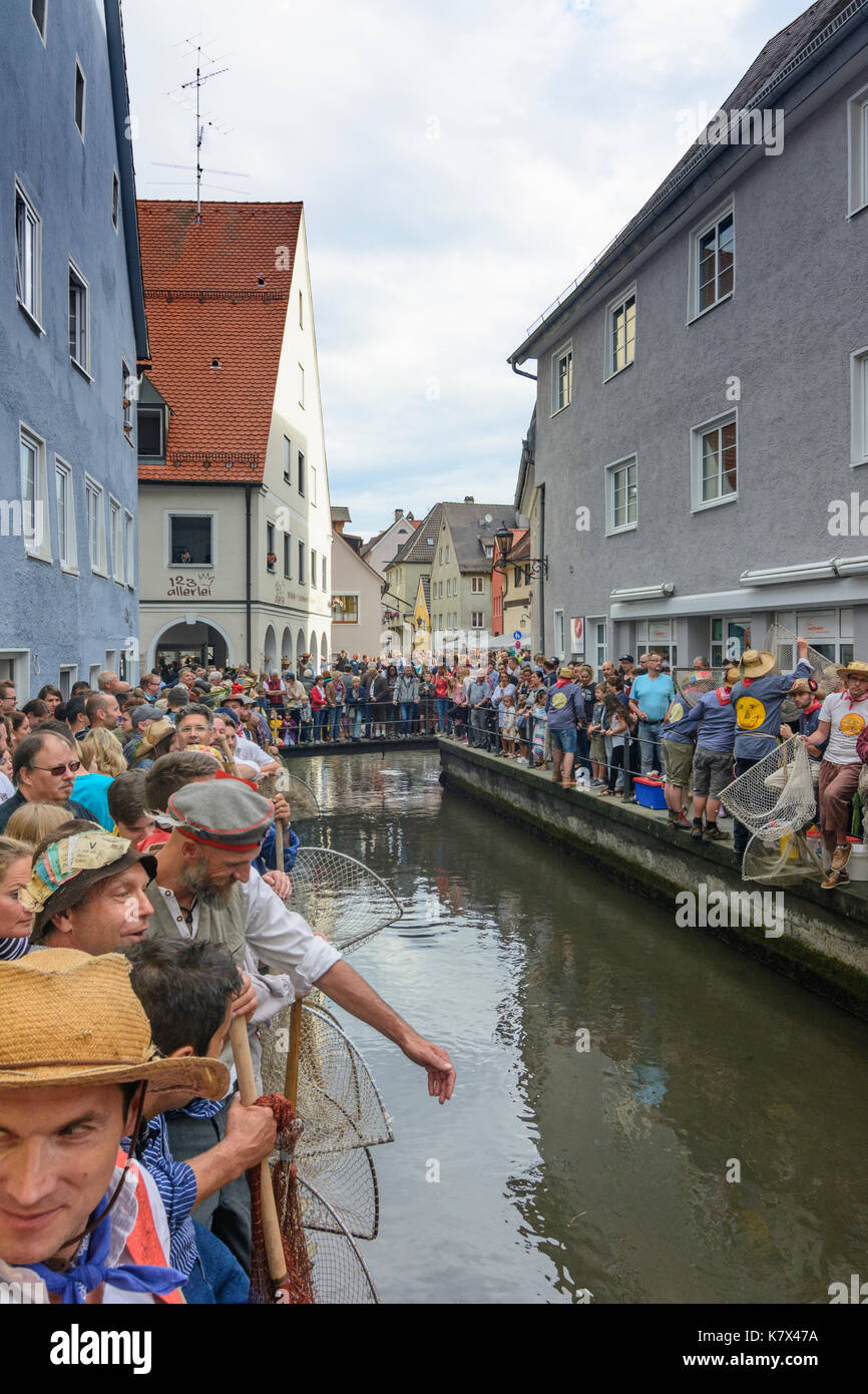 Fischertag (fisher day): men and boys at the canal Stadtbach wait for ...