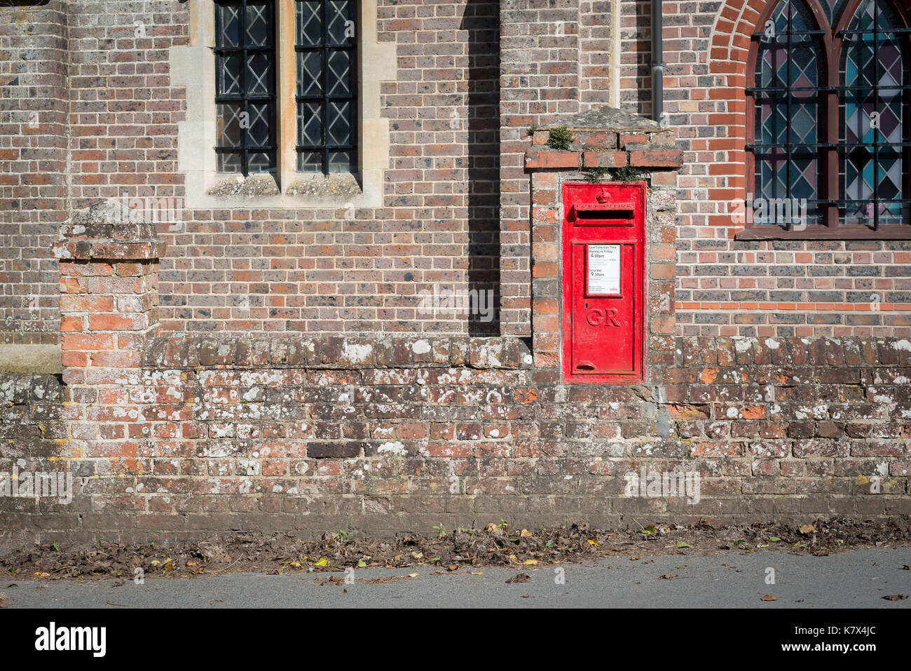 Red post box collection time hi-res stock photography and images - Alamy