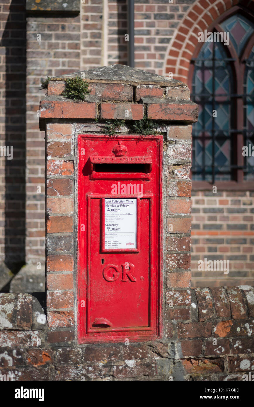 Red post box collection time hi-res stock photography and images - Alamy