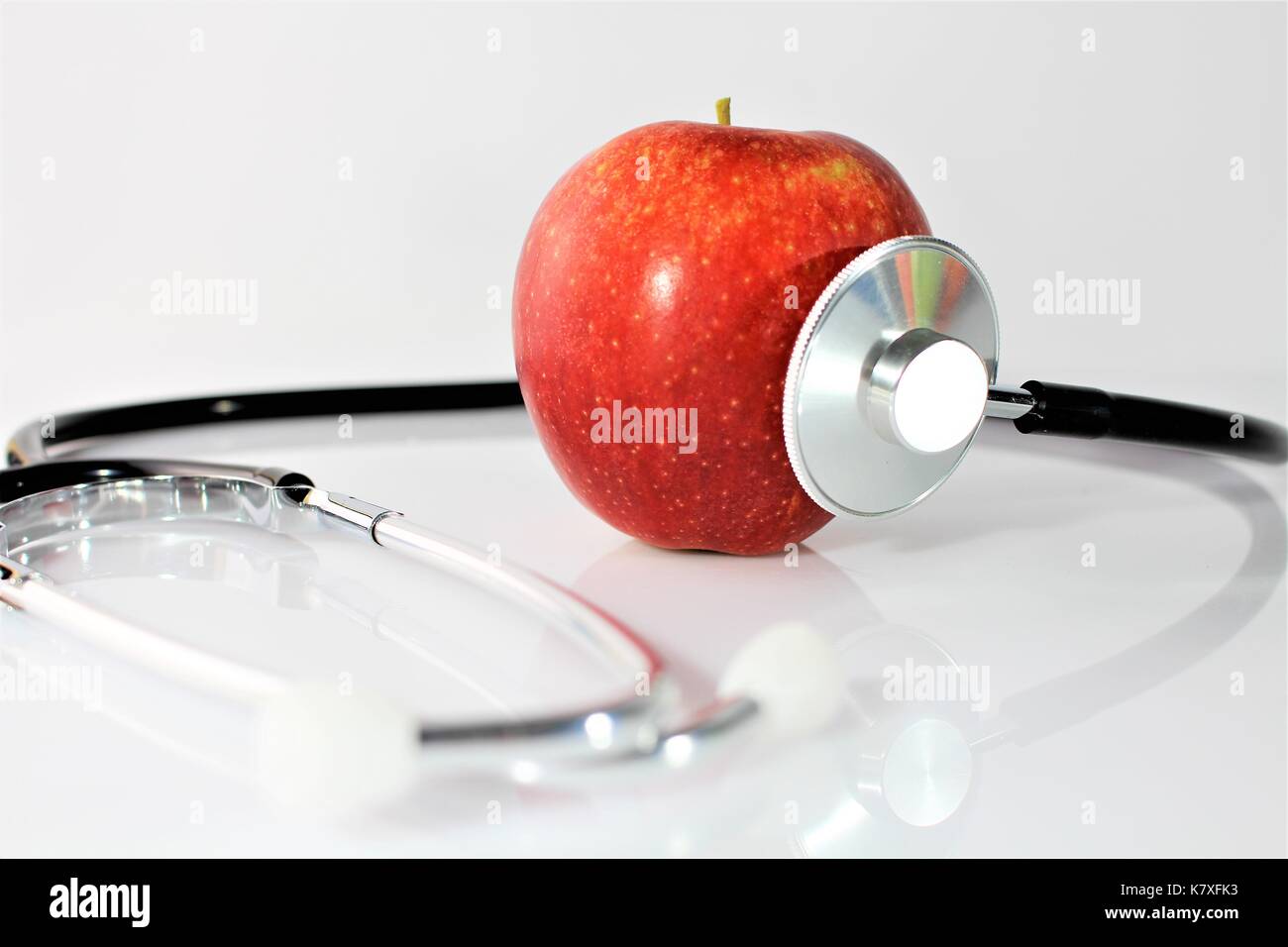 An concept image of a apple and a stethoscope Stock Photo - Alamy