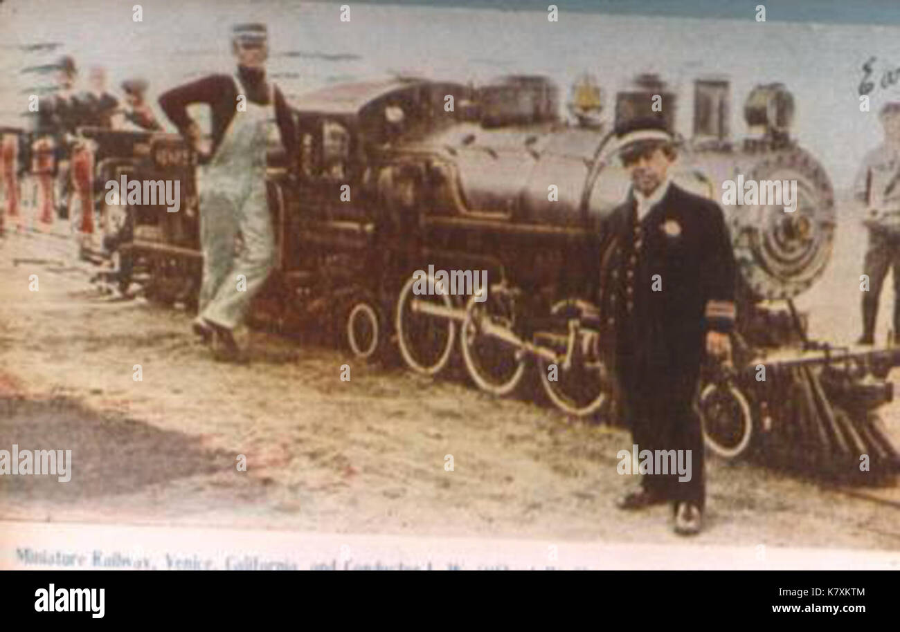 John J. Coit standing left of steam locomotive No. 2 of the Venice ...