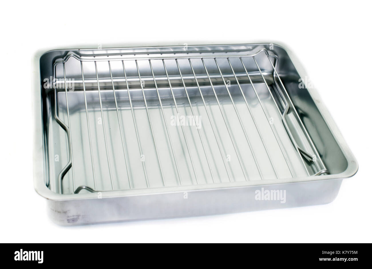 metal dish in front of white background Stock Photo - Alamy