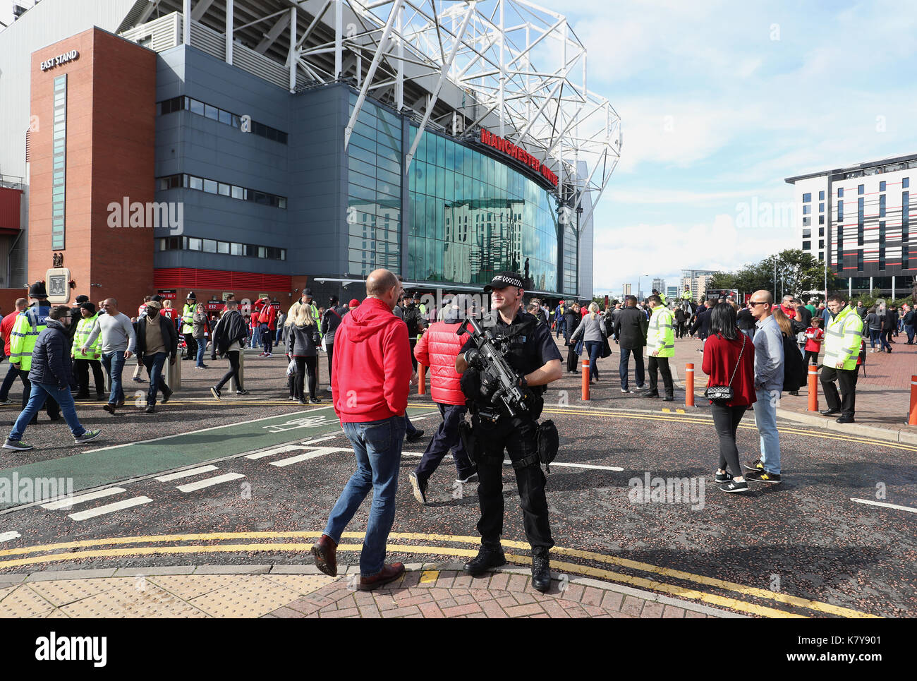 Police watch over fans outside ground hi-res stock photography and ...