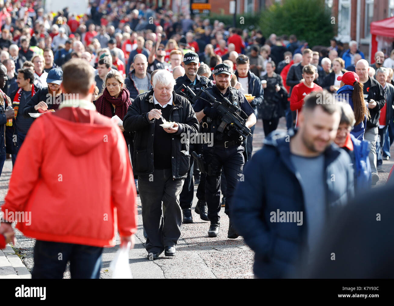 Armed police keep watch over fans outside the ground before the Premier ...