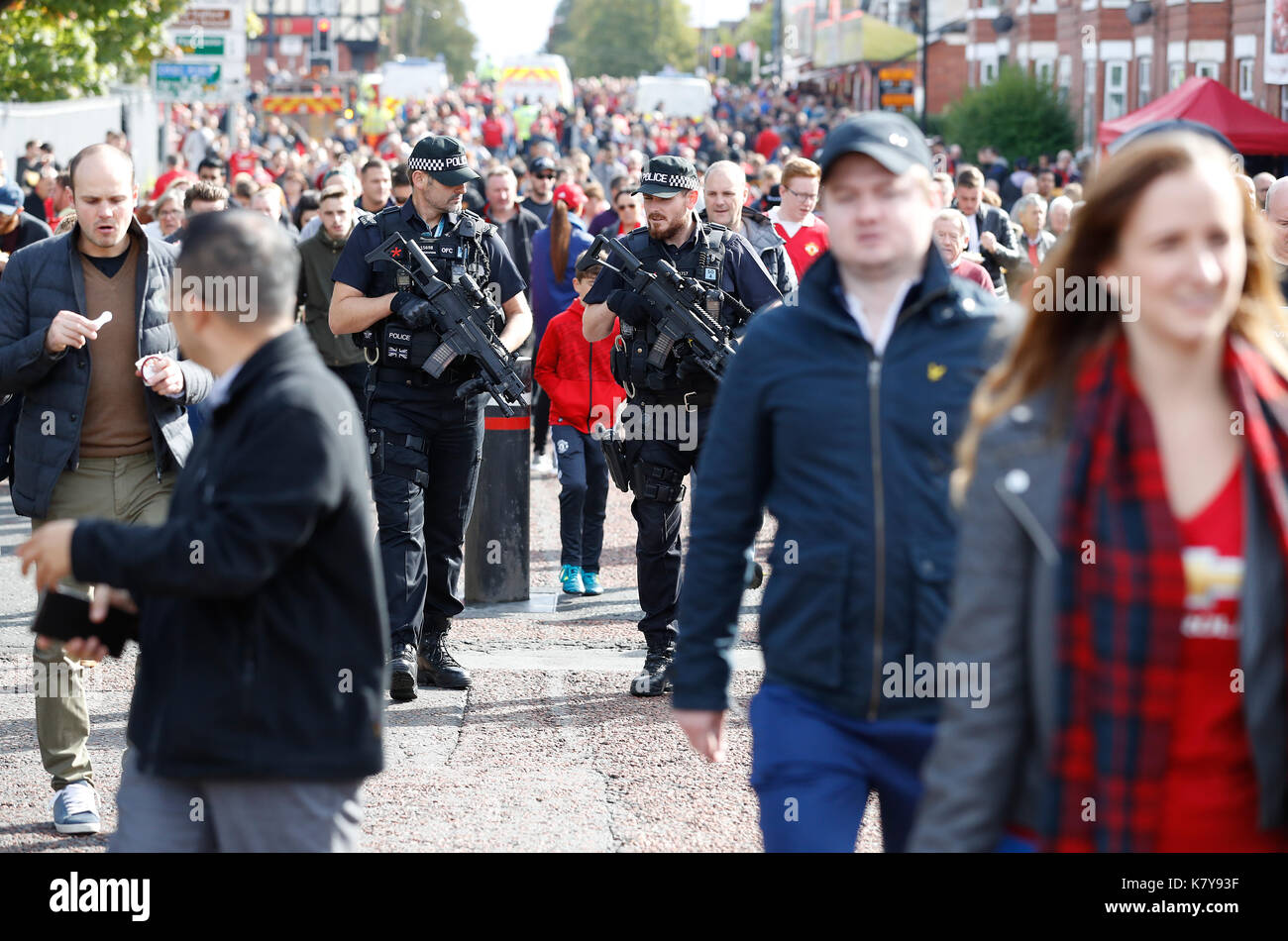 Police watch over fans outside ground hi-res stock photography and ...